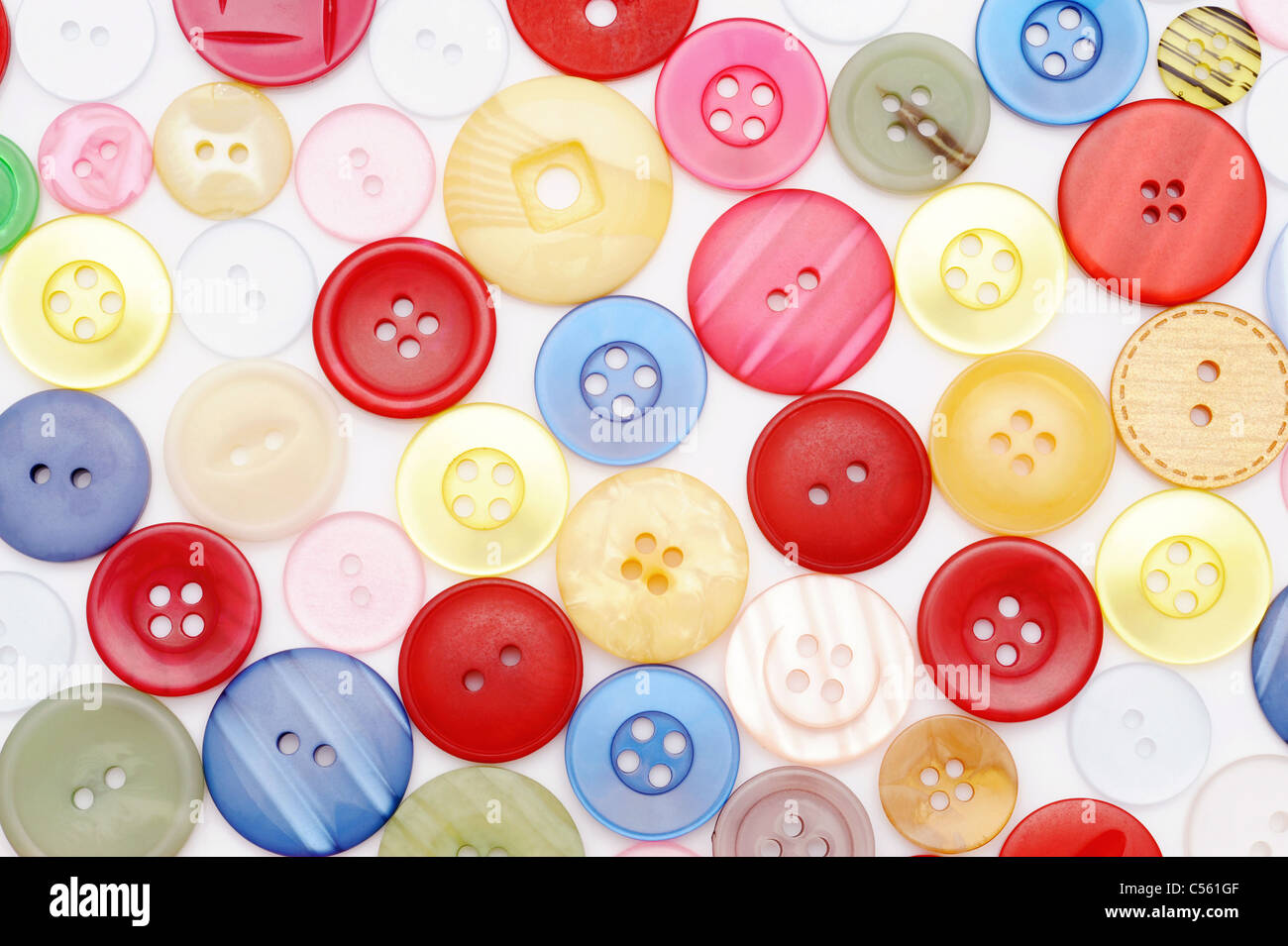 Colorful buttons on white background Stock Photo - Alamy