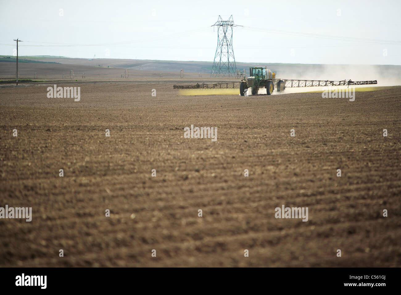 Tractor spraying insecticide fungicide hi-res stock photography and ...