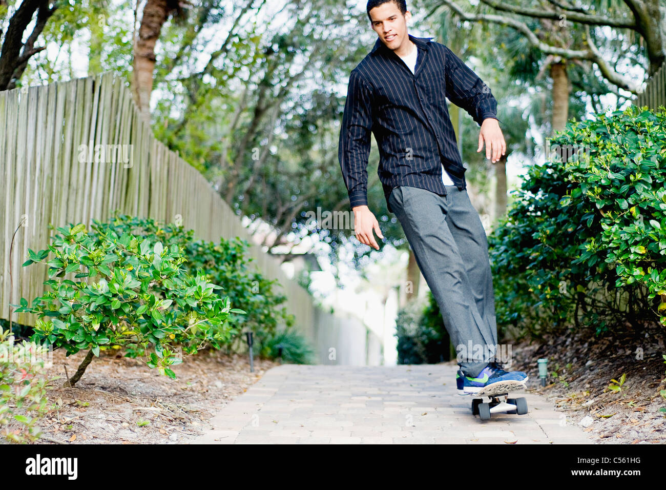 Young man skateboarding structure hi-res stock photography and images ...
