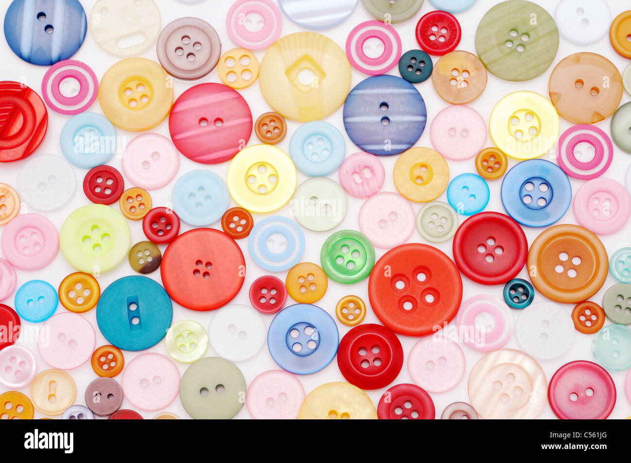 Colorful buttons on white background Stock Photo - Alamy