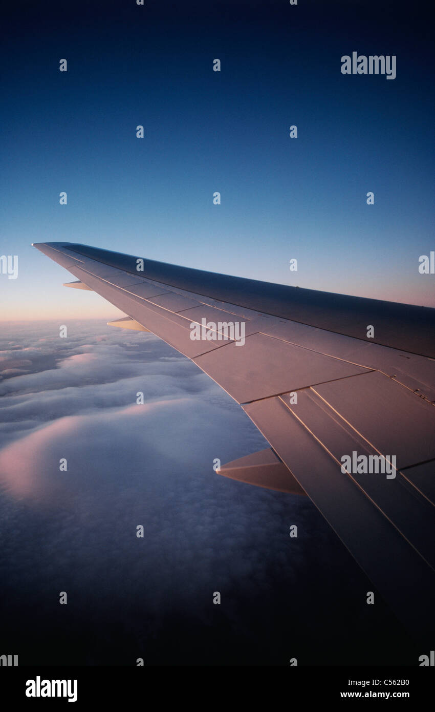 Jet Plane Wing from Cabin Window in Flight Stock Photo - Alamy