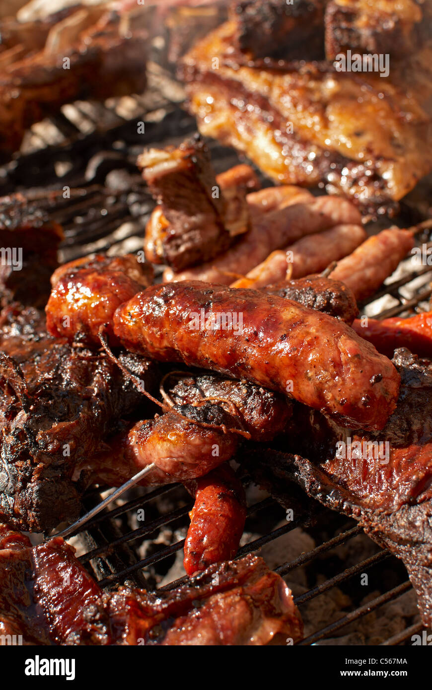 Closeup take of an Argentinian barbecue, grilling meat Stock Photo - Alamy