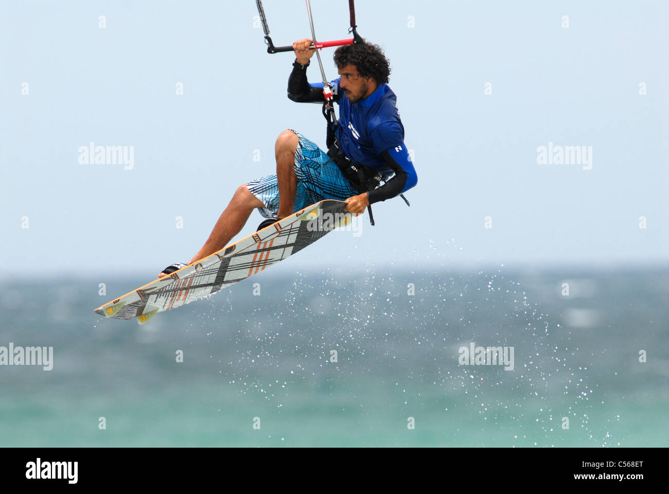 Kite surfer jumping Stock Photo - Alamy