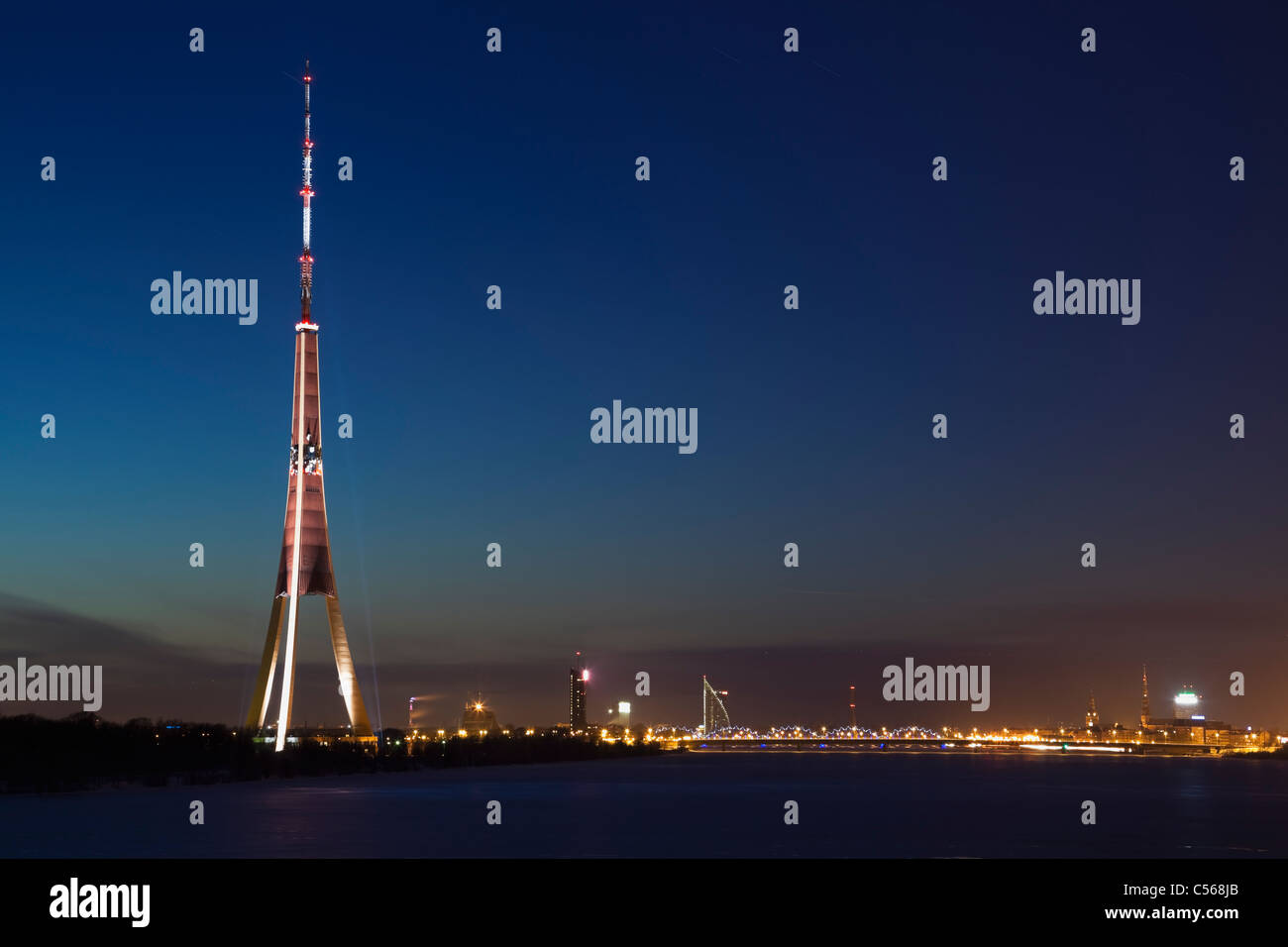 Television tower in Riga illuminated in the night Stock Photo - Alamy
