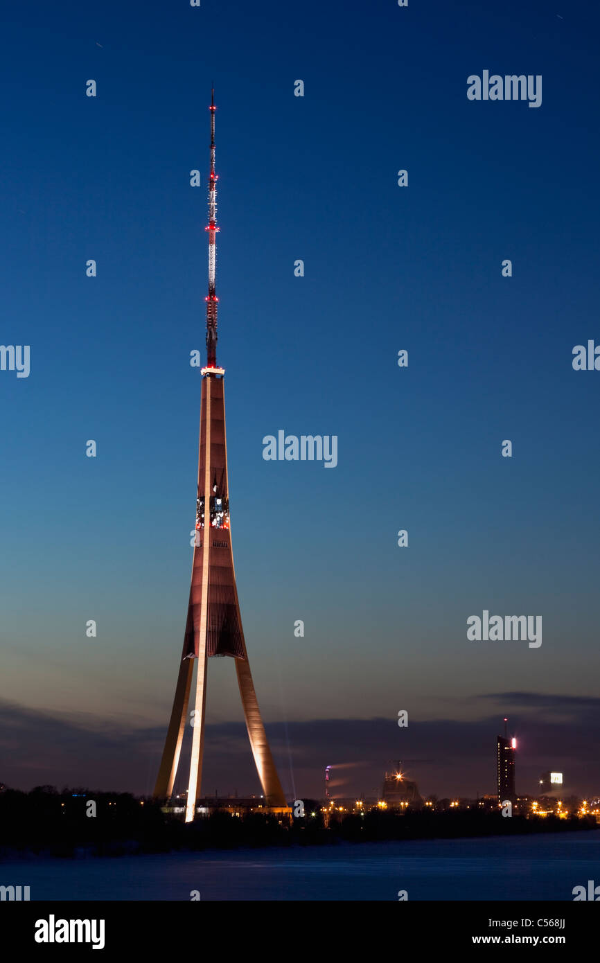 Television tower in Riga illuminated in the night Stock Photo - Alamy