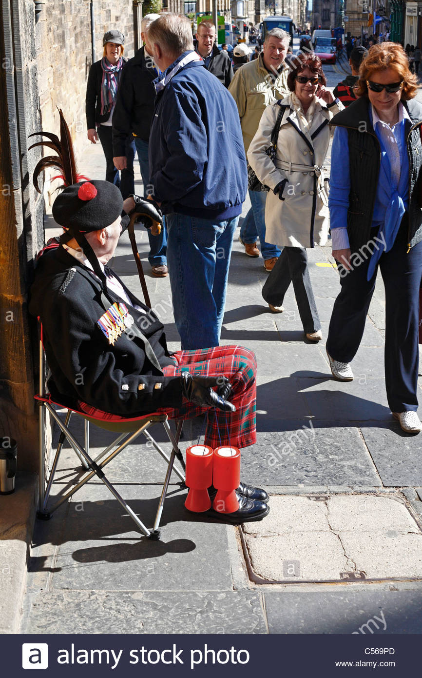 Charity collection tin street hi-res stock photography and images - Alamy