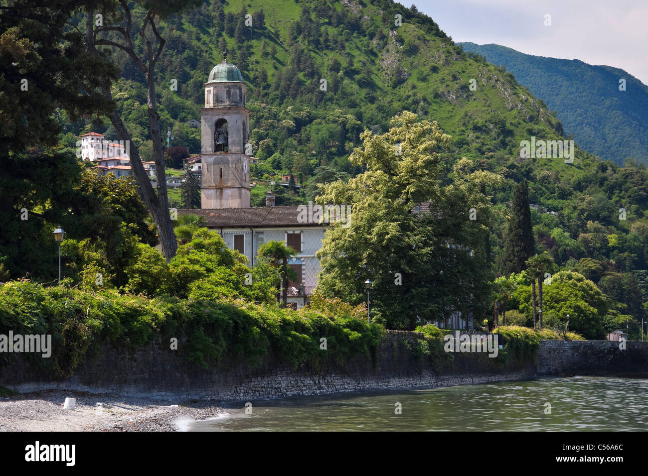 Old church in the daylight at the shore of lake Como in Bellagio, Italy ...