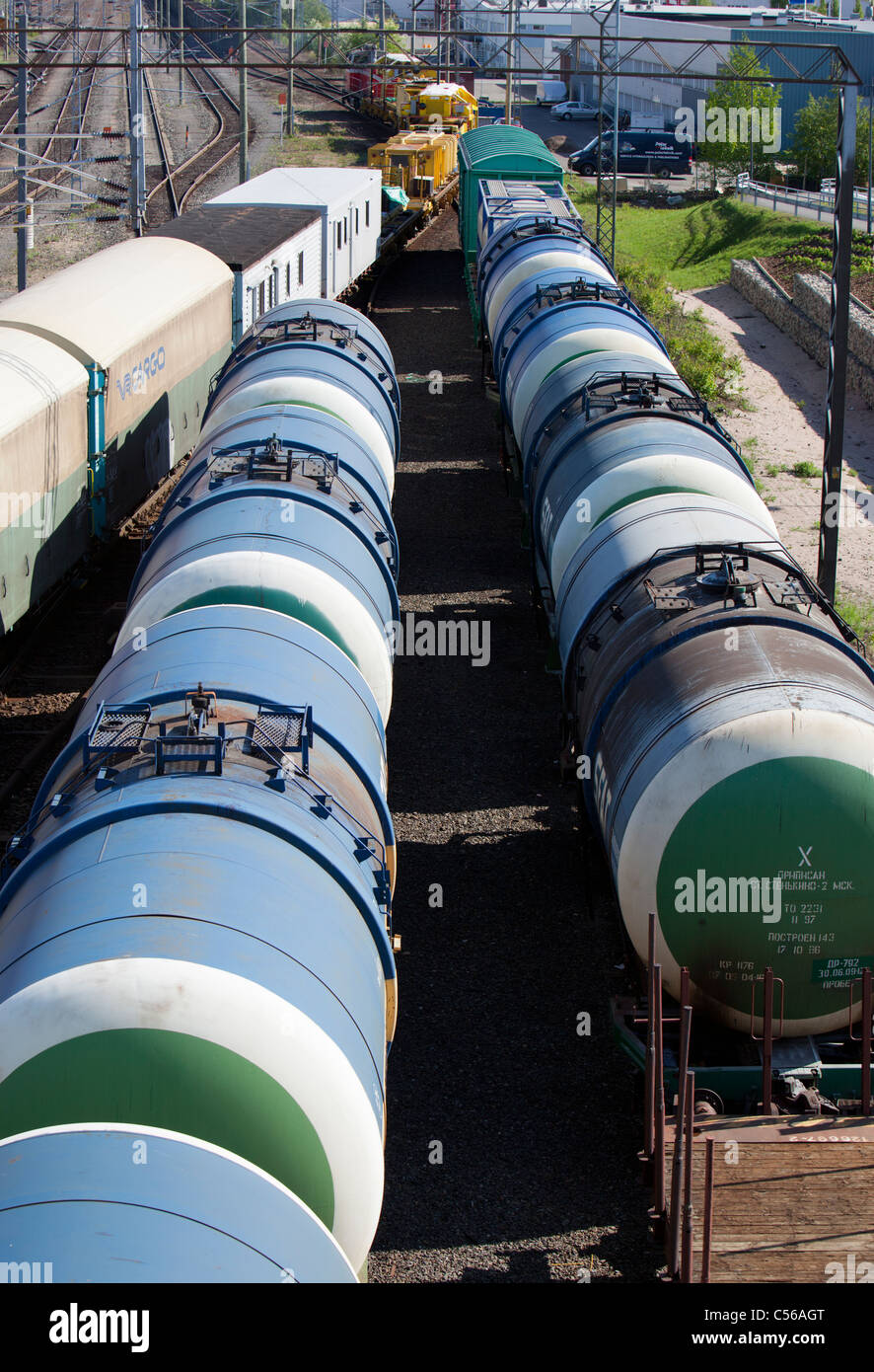 Traffic jam in railroad yard , tanker trains waiting for cargo train to ...