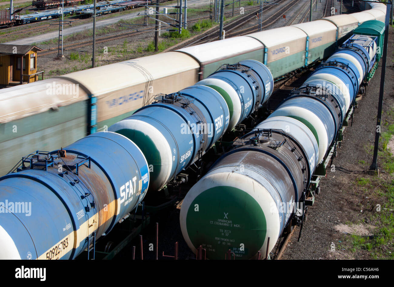Traffic jam at railroad yard , tanker trains waiting for cargo train to ...