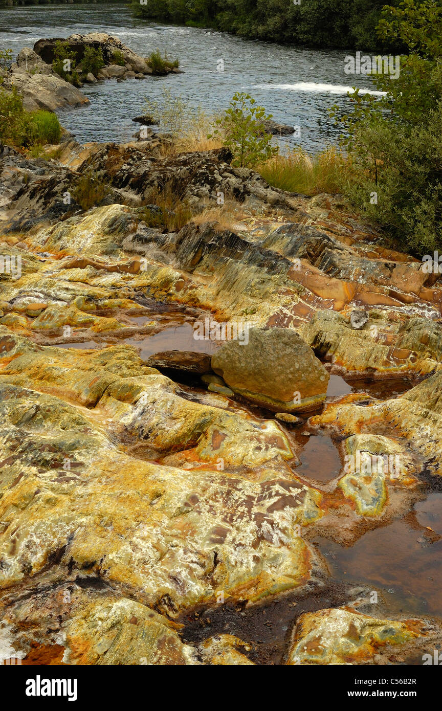 Natural sediments on the rocks beside the river Sil, Galicia, Spain ...