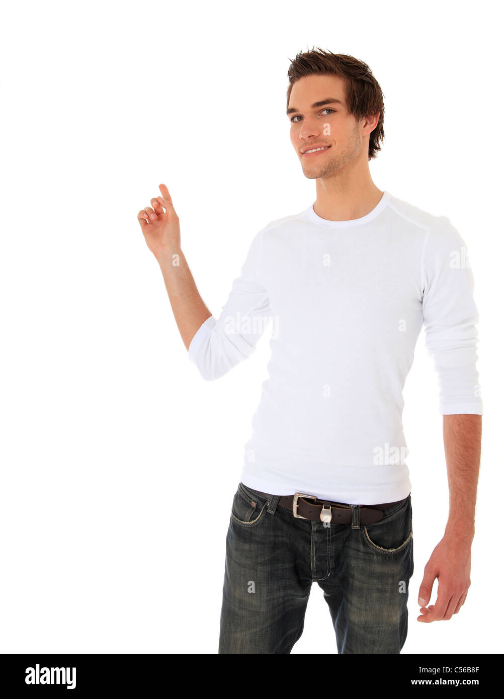Attractive young man pointing to the side. All on white background ...