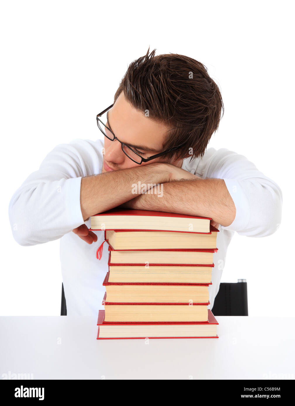 Attractive student taking a break. All on white background Stock Photo ...