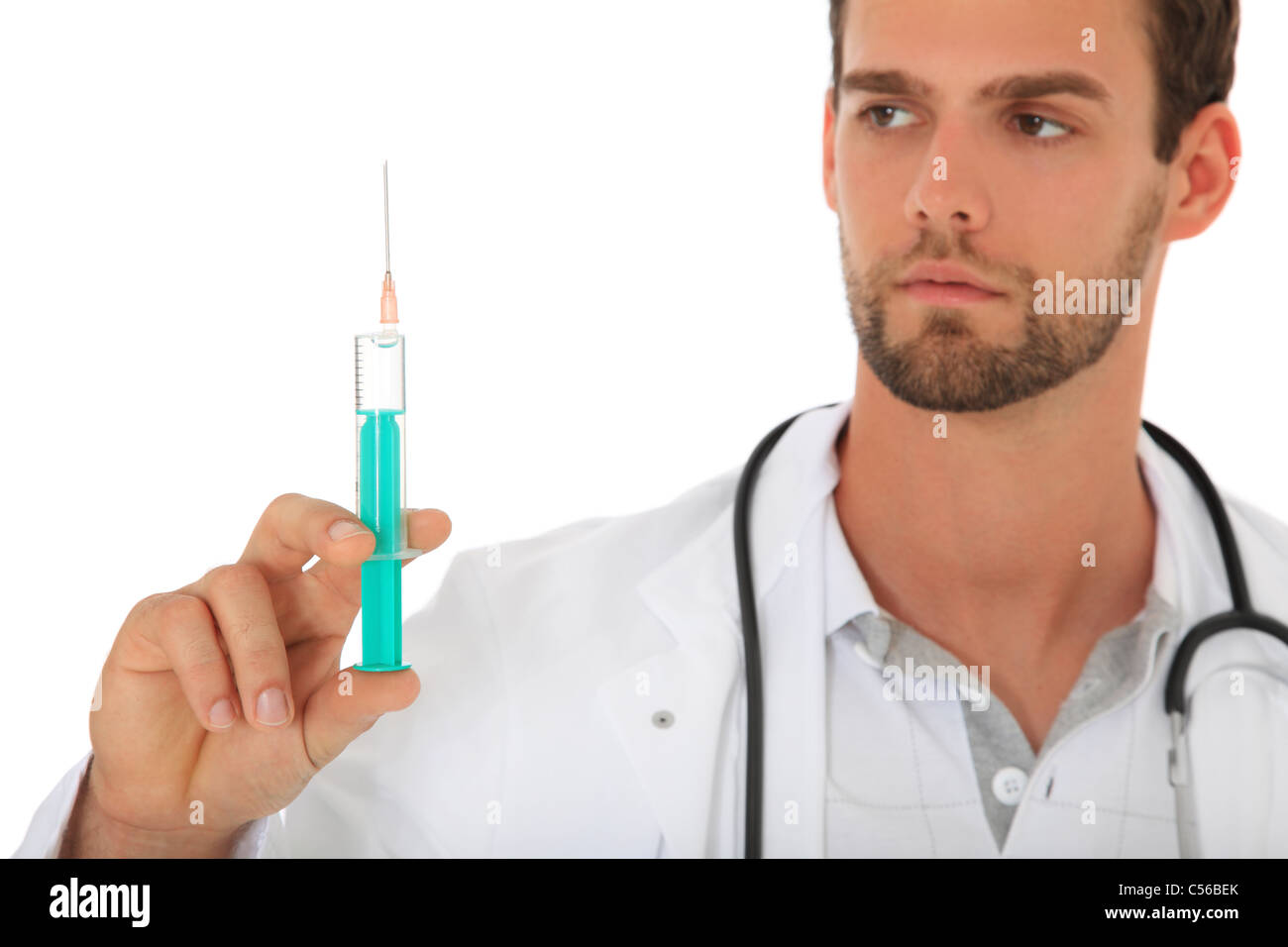 Doctor holding prepared injection. All on white background Stock Photo ...