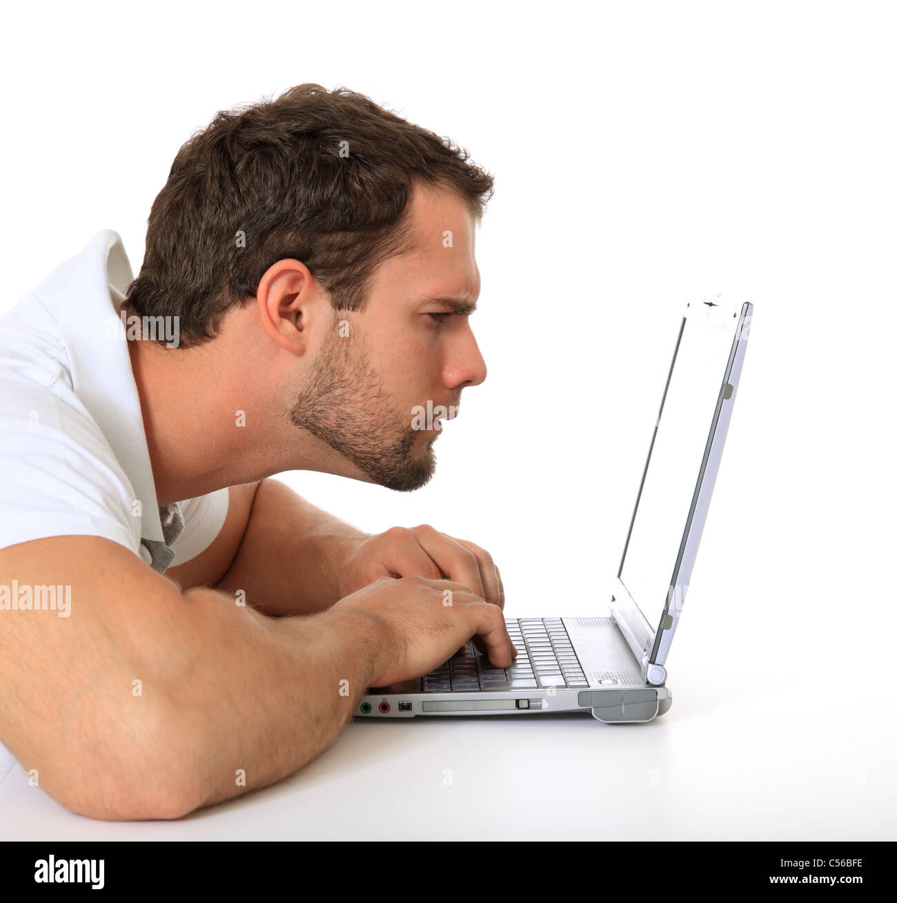 Young man got a problem with his laptop. All on white background Stock ...