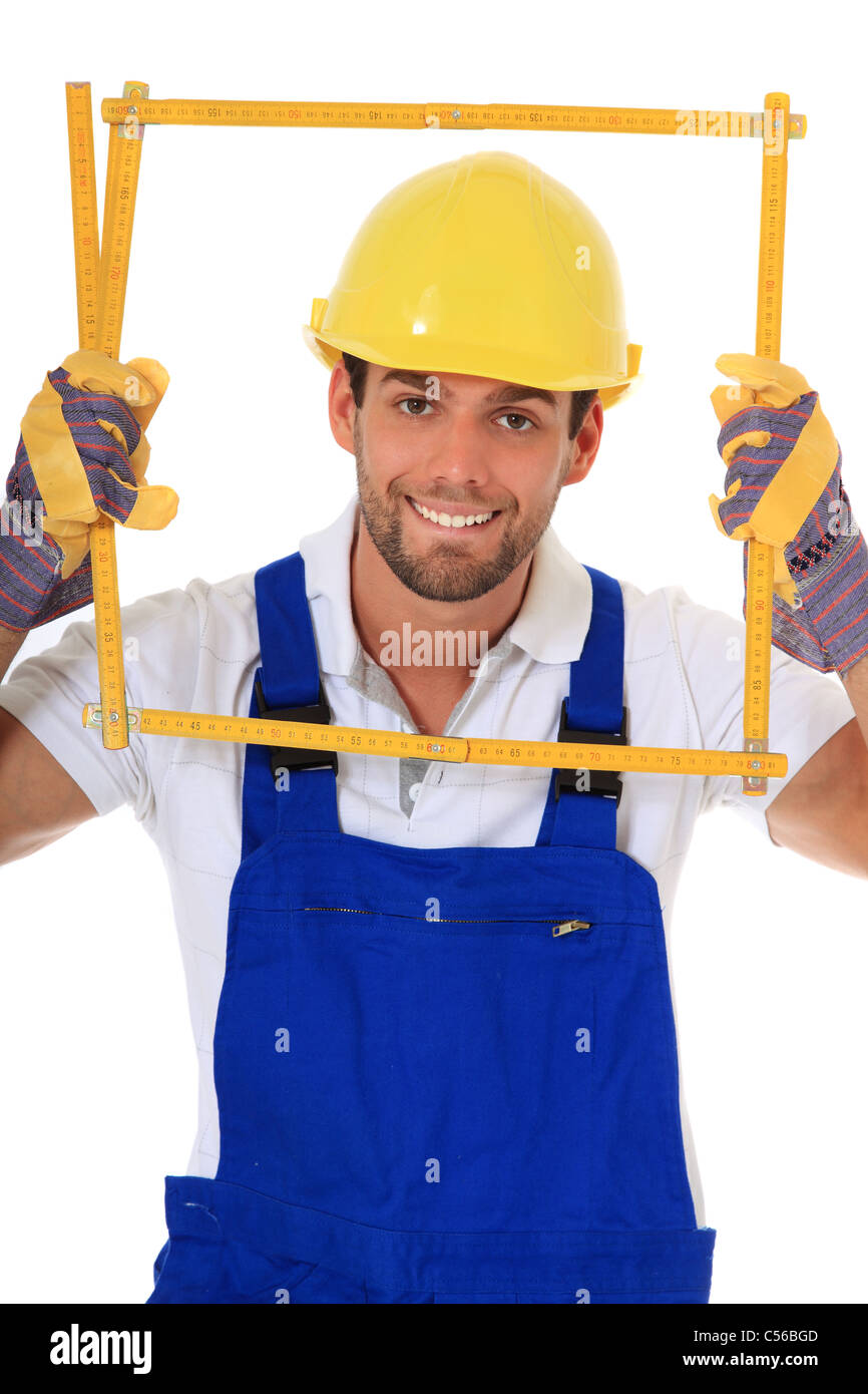 Clumsy manual worker. All on white background Stock Photo - Alamy