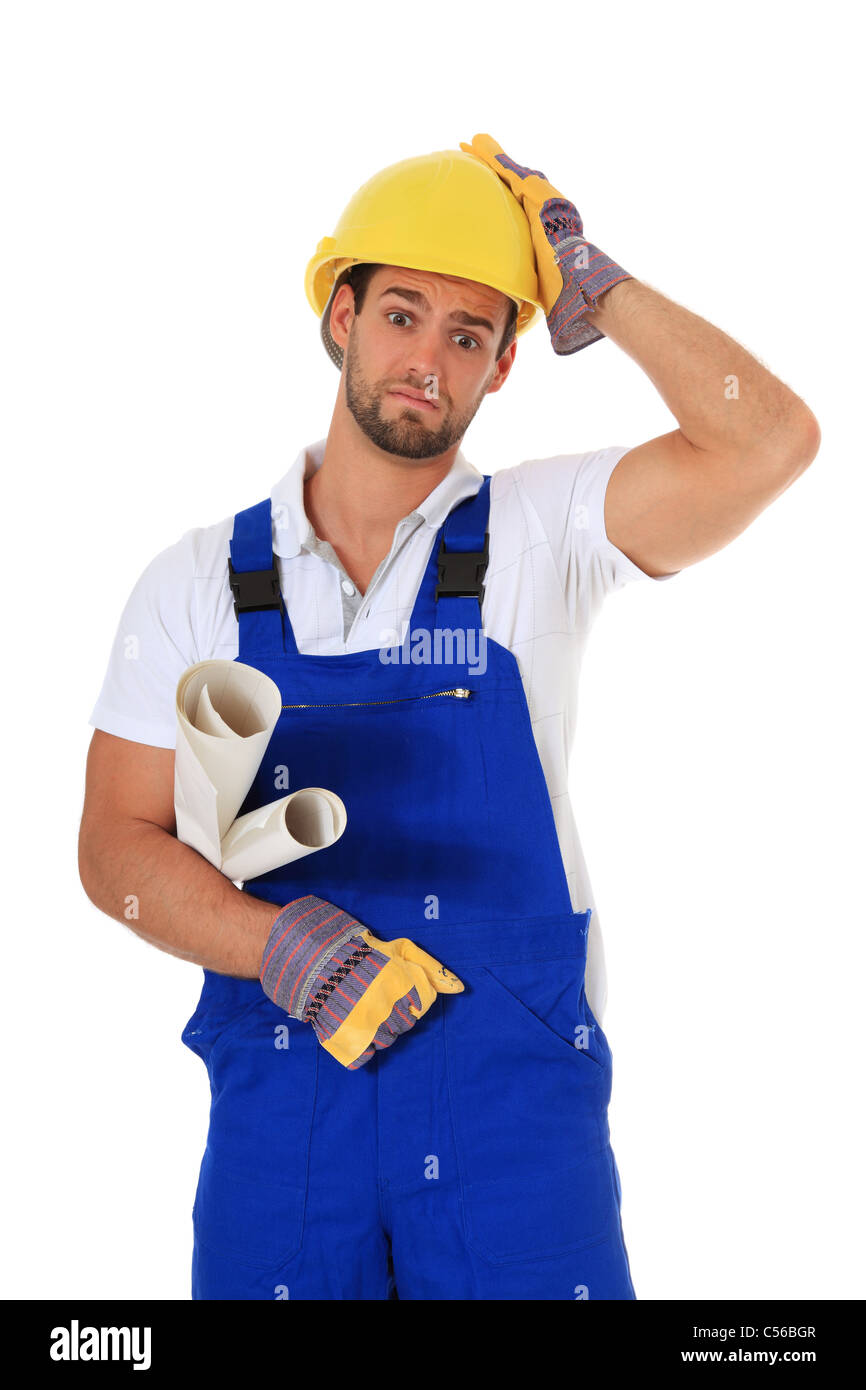 Clueless manual worker. All on white background Stock Photo - Alamy