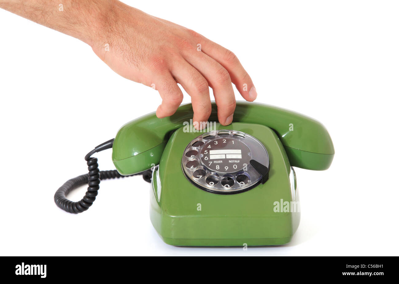 Hand grabs old phone hi-res stock photography and images - Alamy