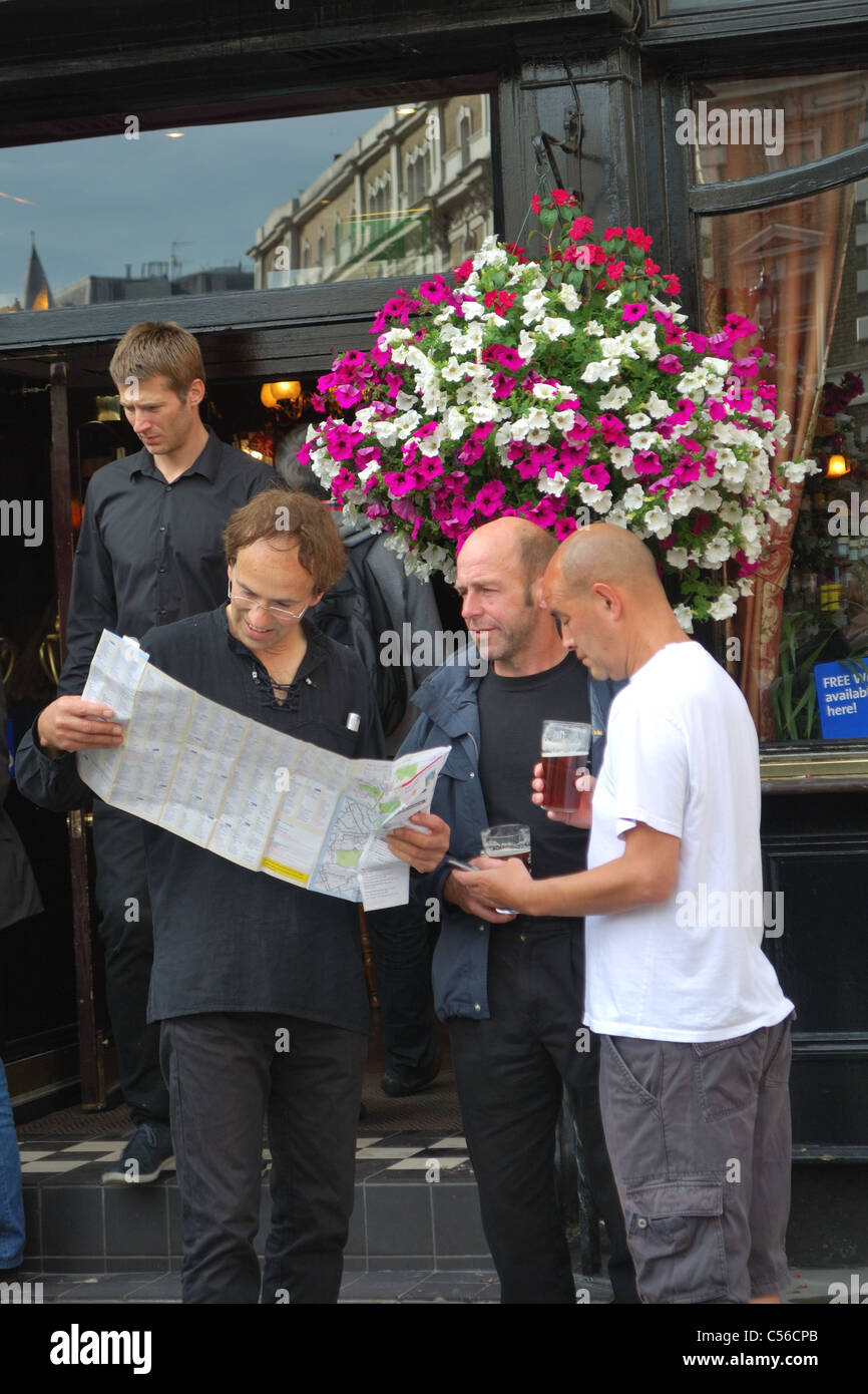 Map men hi-res stock photography and images - Alamy