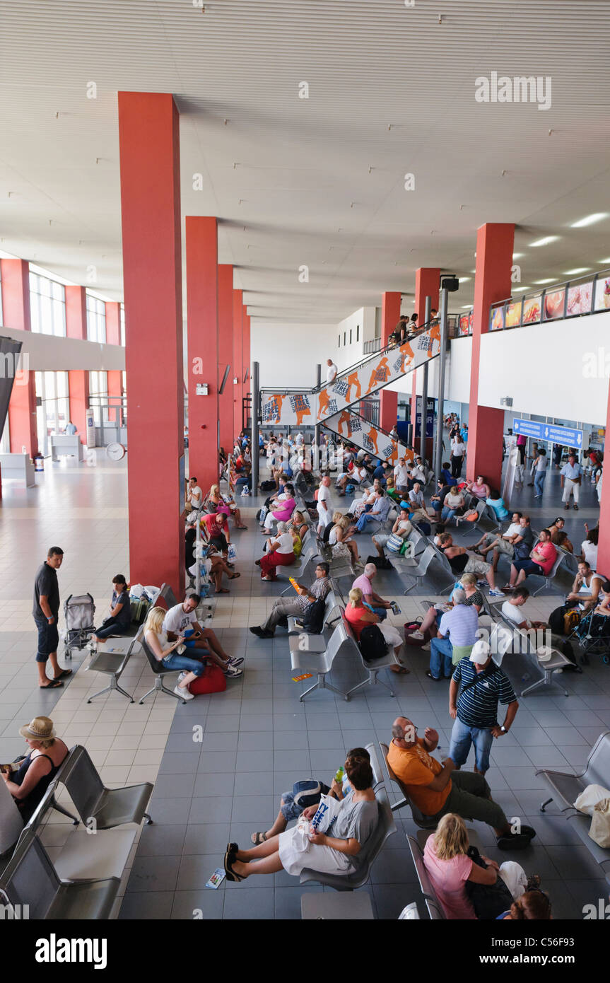 People waiting to catch flights back home at Zakynthos airport Stock ...