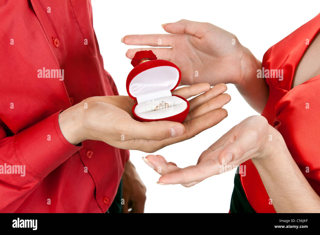 man's hand gives a box with a ring with a diamond girl Stock Photo - Alamy