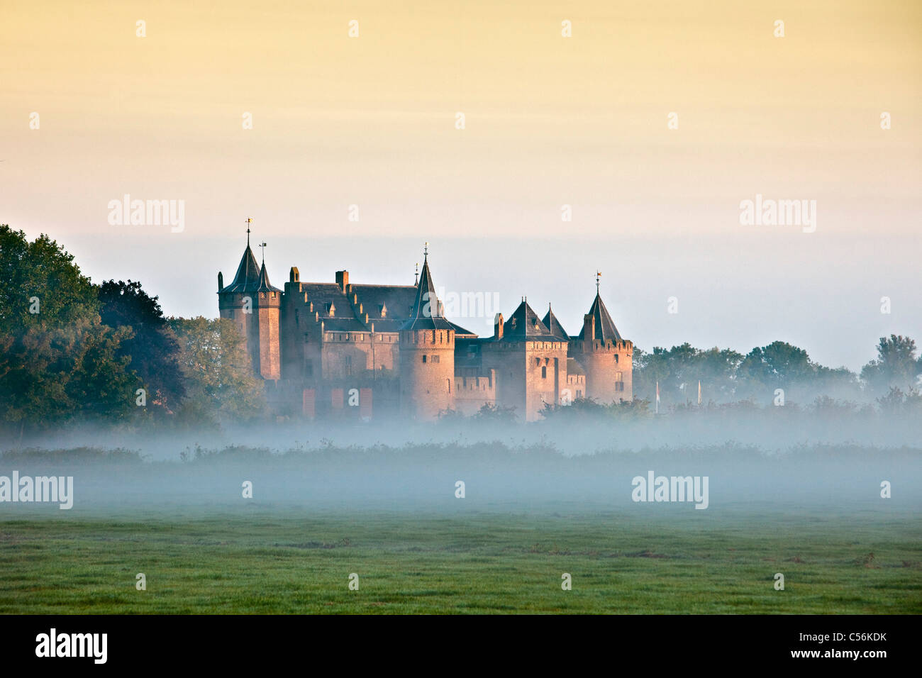 The Netherlands, Muiden, Castle called Muiderslot in mist at dawn Stock ...