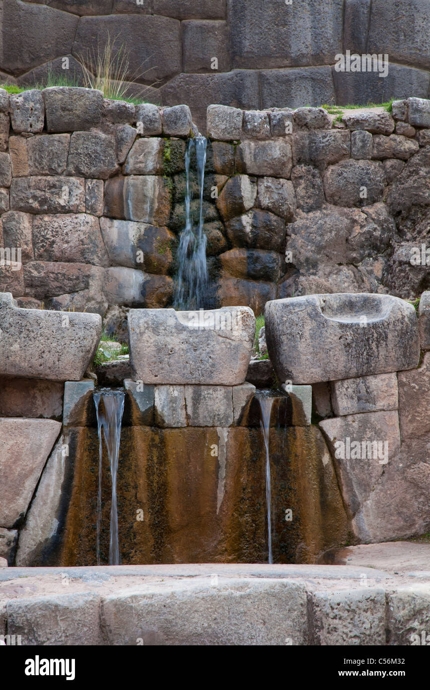 Water fountains at the archaelogical site of Tambo Machay, near Cusco ...