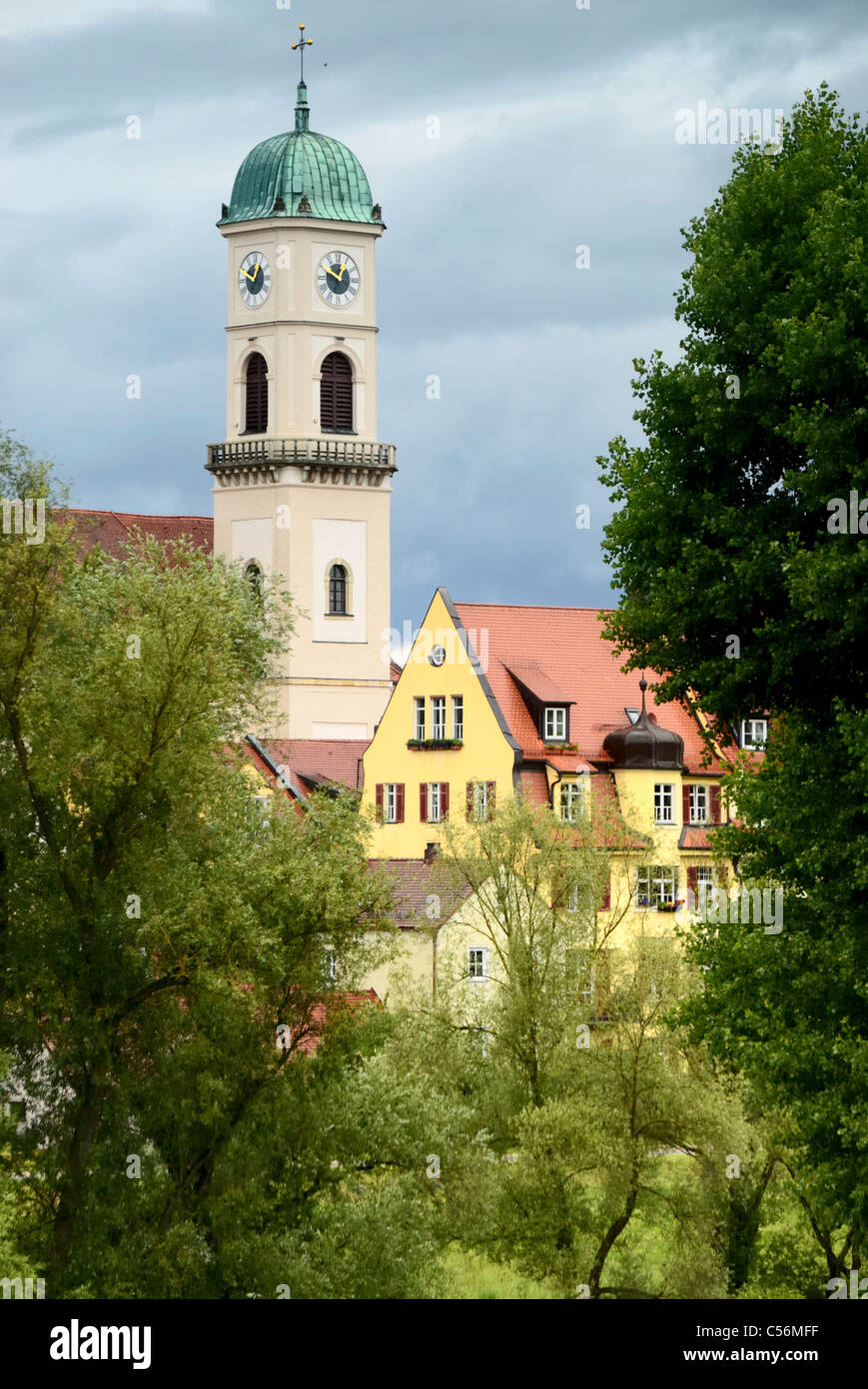 Church tower between trees Stock Photo - Alamy