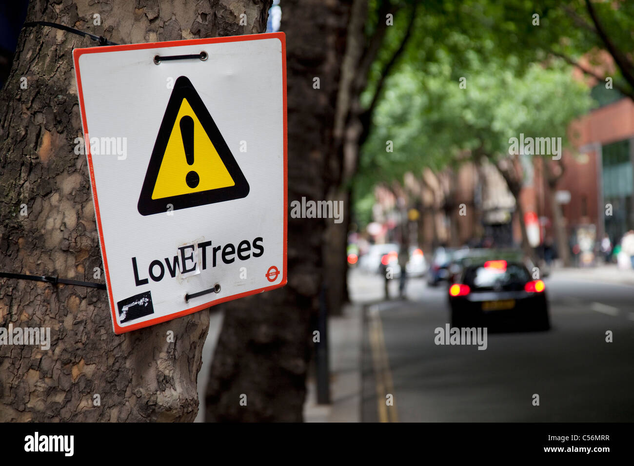 Warning sign for Low Trees on Shaftesbury Avenue that has been altered ...