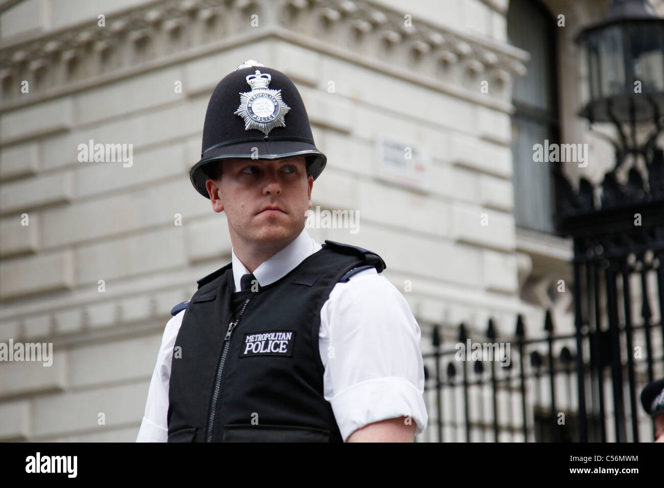 Policeman outside Downing Street in central London. Part of a strong ...