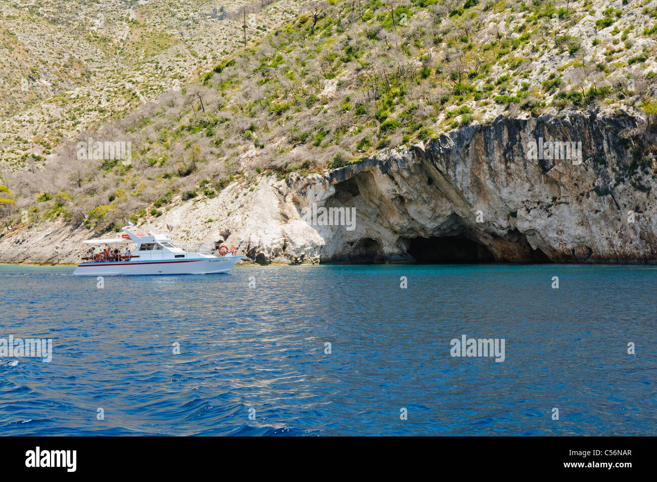 Caves along the limestone coastal cliffs of the Greek island Zante ...