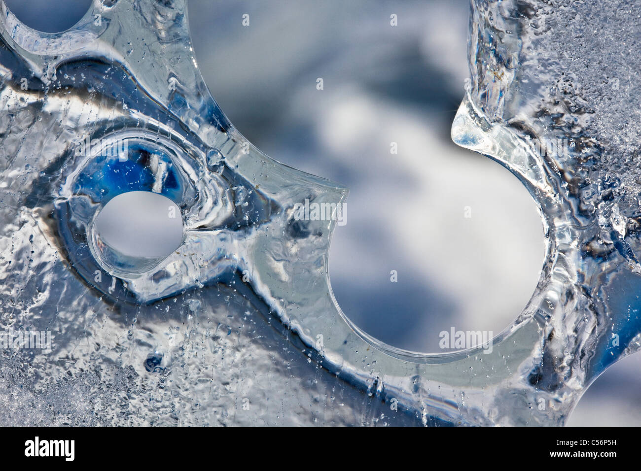 The Netherlands, Oosterdijk, CU piece of ice on frozen lake called ...