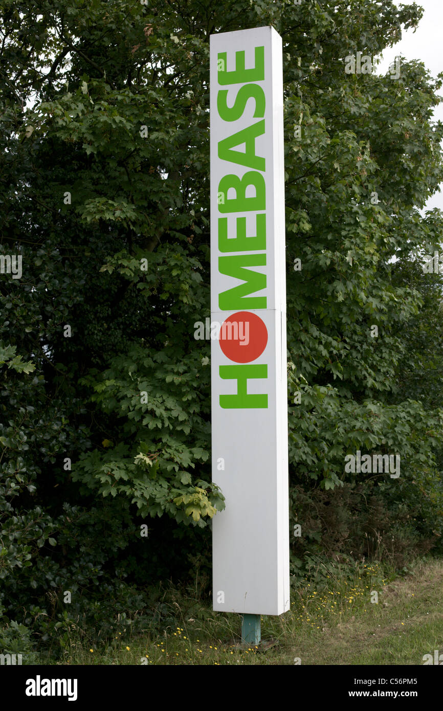 Homebase vertical sign green red outside superstore Stock Photo - Alamy