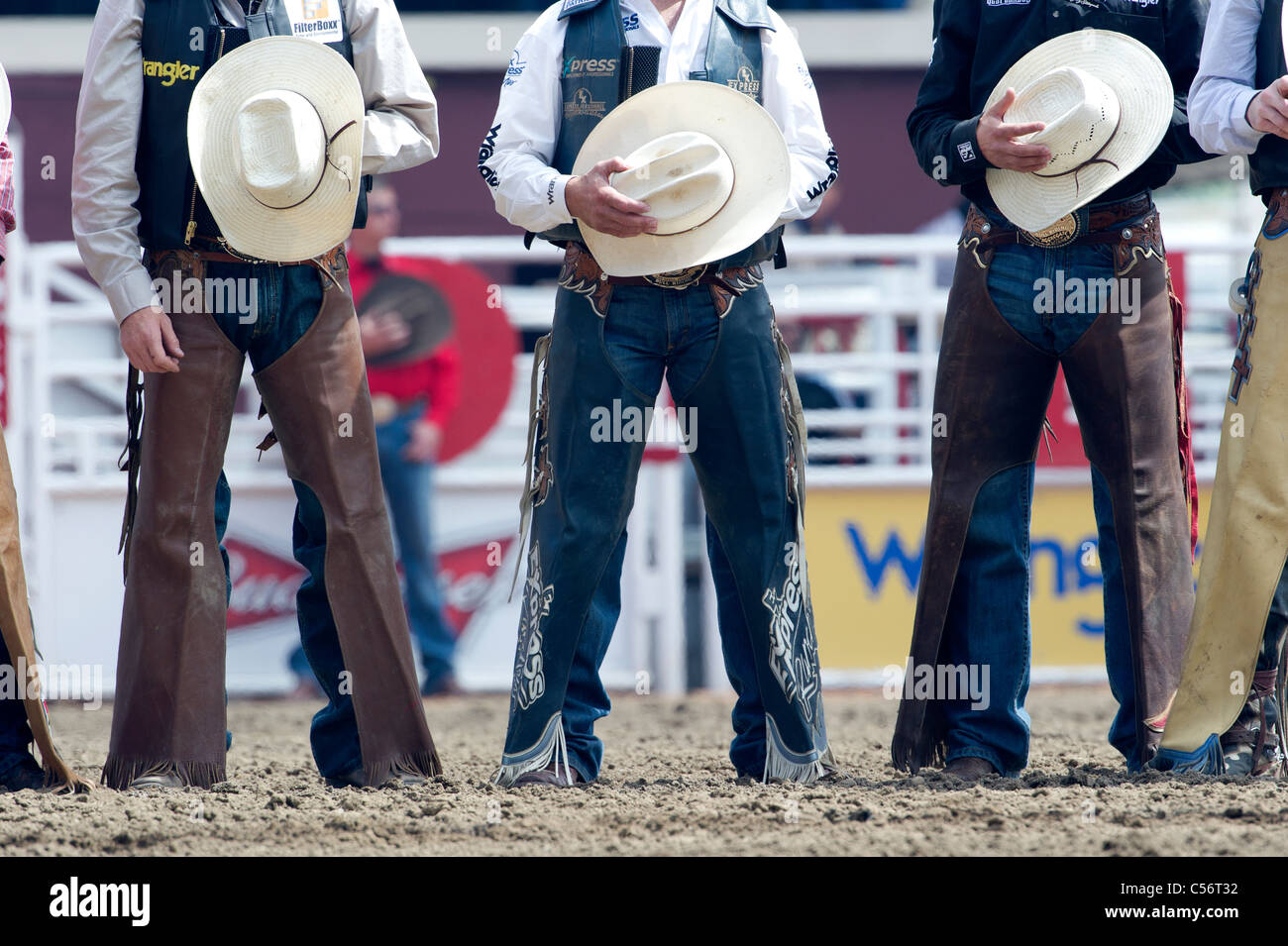A row of cowboys at the Opening Ceremonies at the Calgary Stampede ...