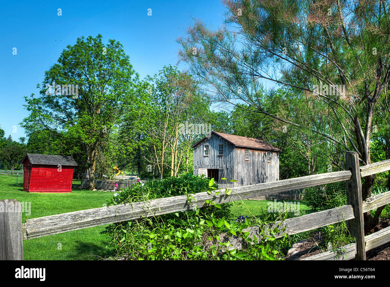 Small Barn and Red Corn Crib Stock Photo - Alamy