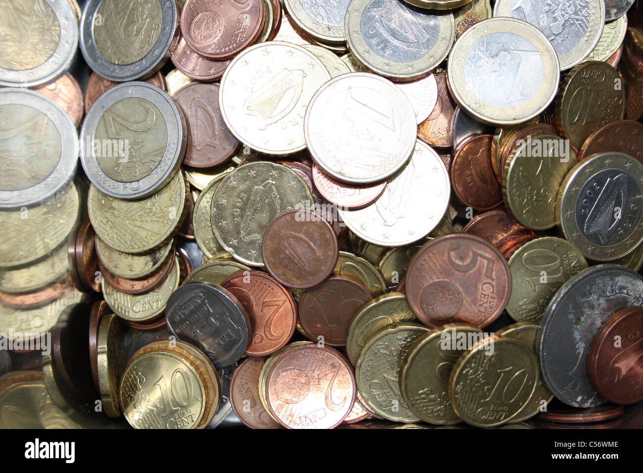 Change money to coins Stock Photo - Alamy