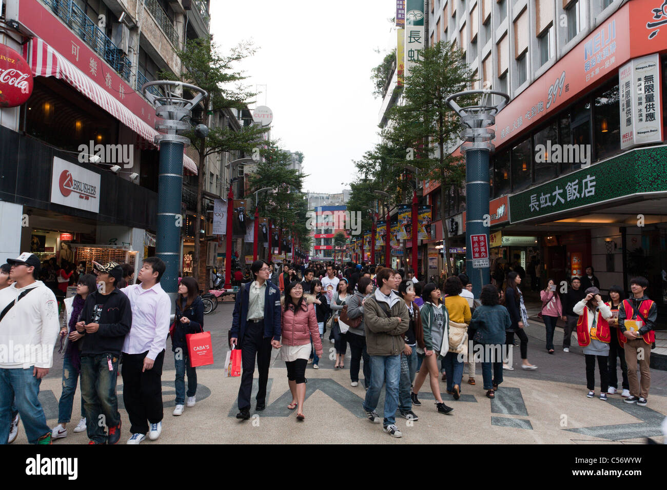 People walking at Ximending neighborhood and shopping district in the ...