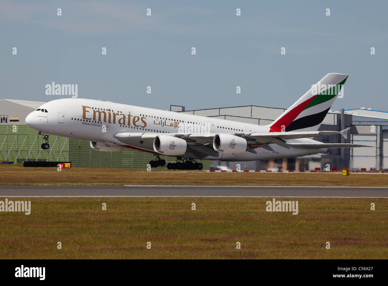 Emirates Airlines Airbus A380 super jumbo taking off at Manchester ...