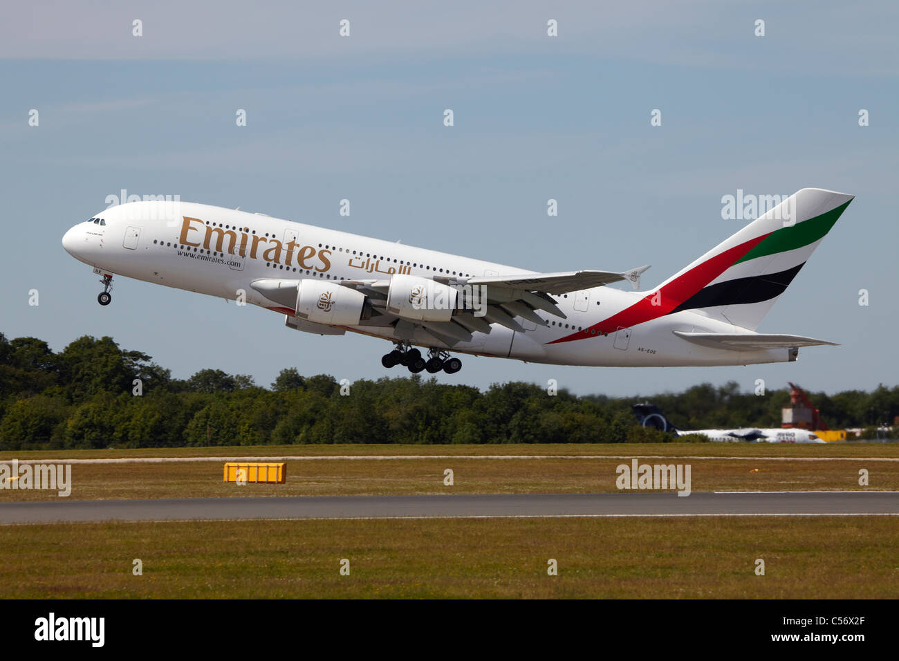 Emirates Airlines Airbus A380 super jumbo taking off at Manchester ...