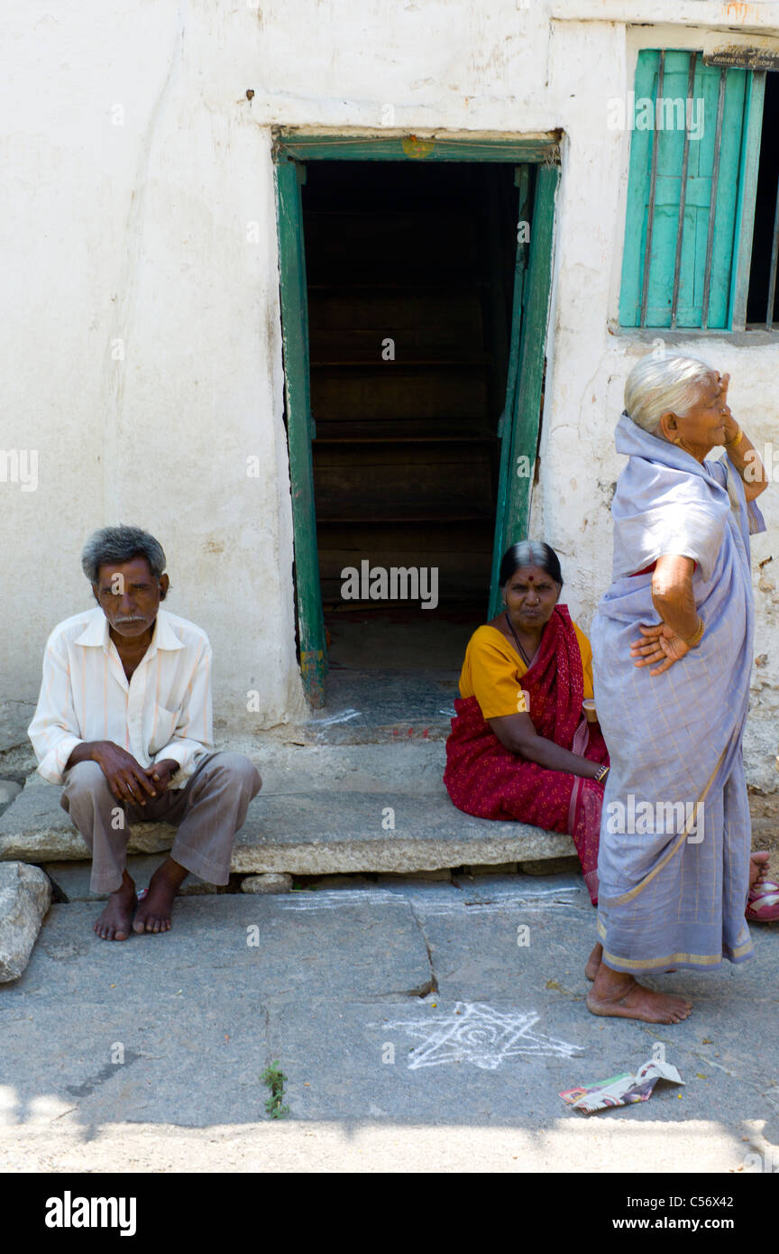 A traditional indian family in front of their home, Mysore, Karnataka ...