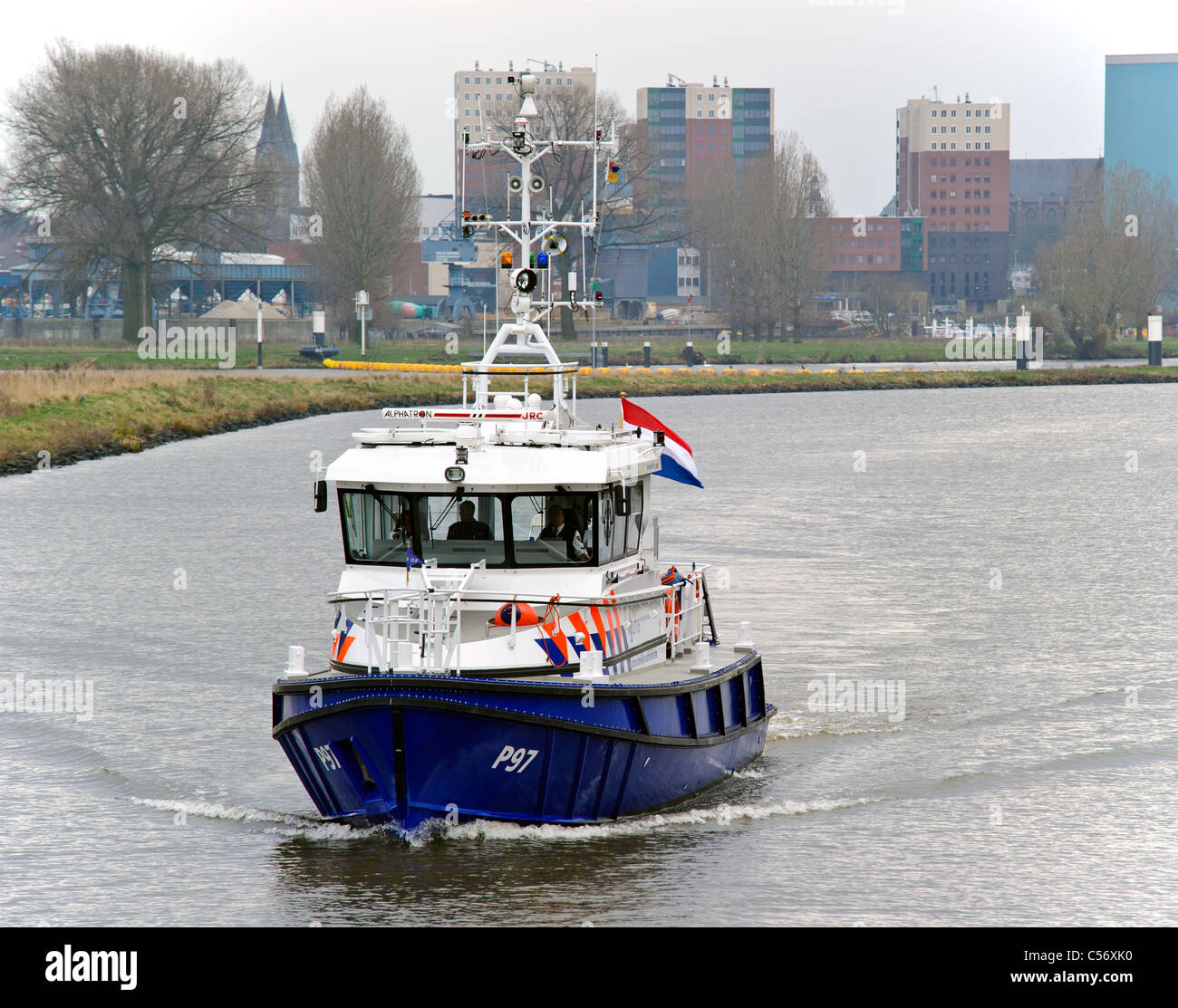 dutch police boat patrolling river Stock Photo - Alamy