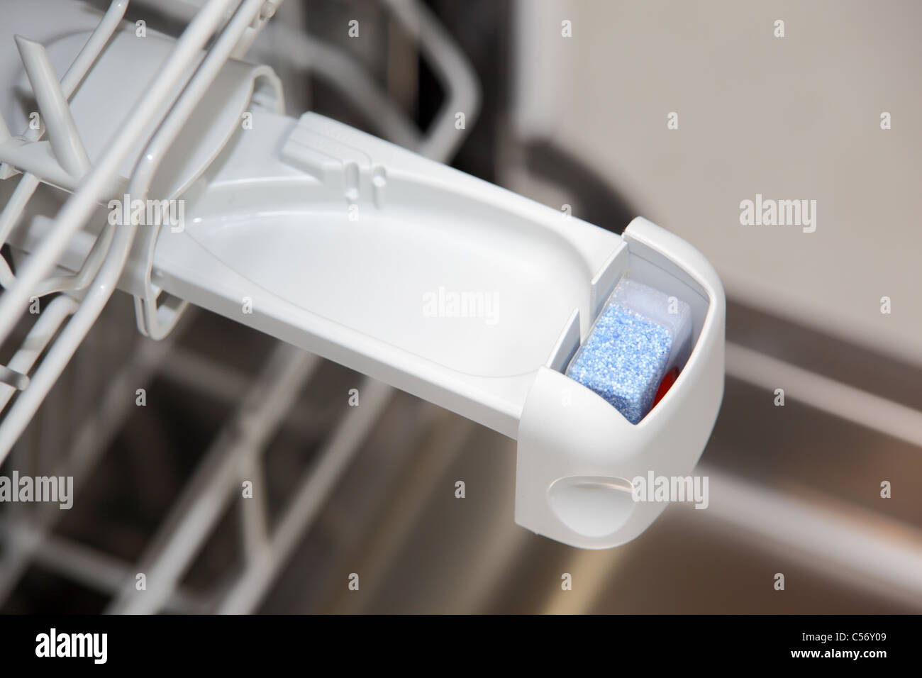Close-up of tablet in dishwasher detergent box Stock Photo - Alamy