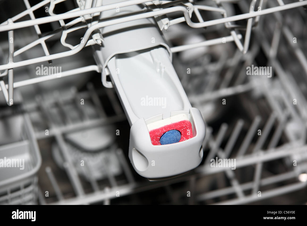 Close-up of tablet in dishwasher detergent box Stock Photo - Alamy