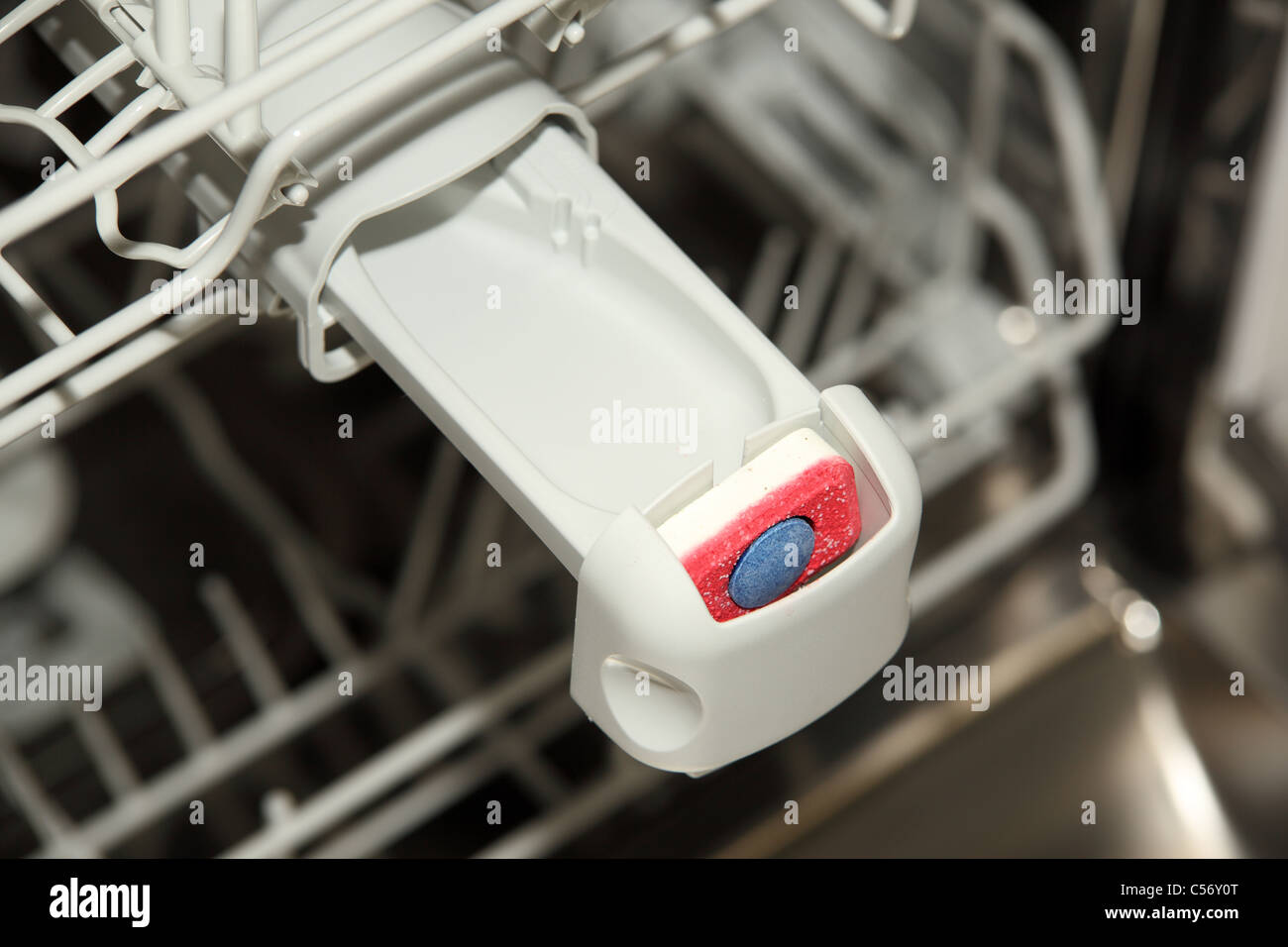 Close-up of tablet in dishwasher detergent box Stock Photo - Alamy