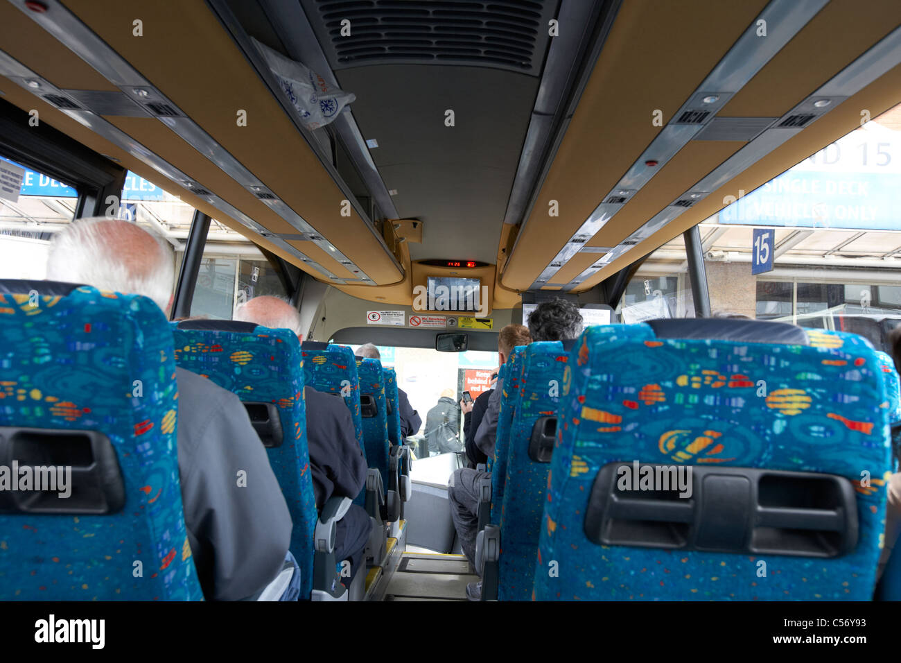 passengers on an ulsterbus express cross border coach in Belfast ...