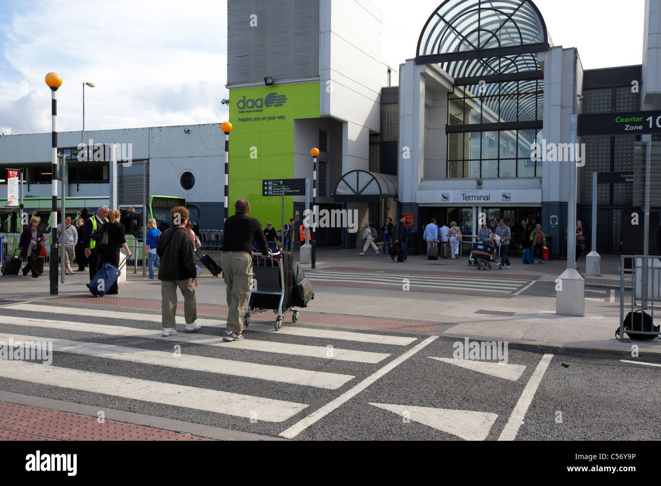 passengers crossing pedestrian crossing at old terminal 1 entrance ...