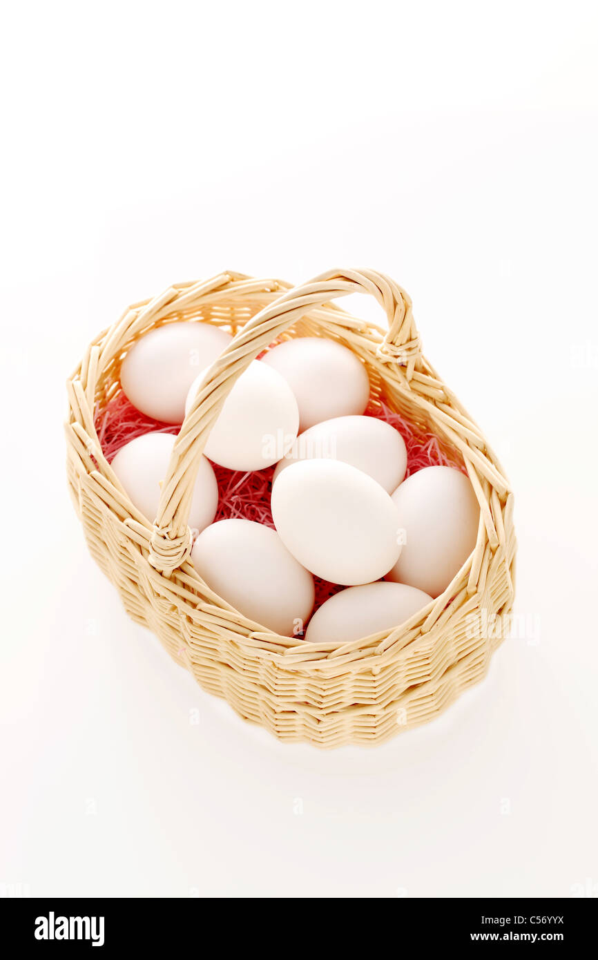 Eggs in a basket Stock Photo - Alamy