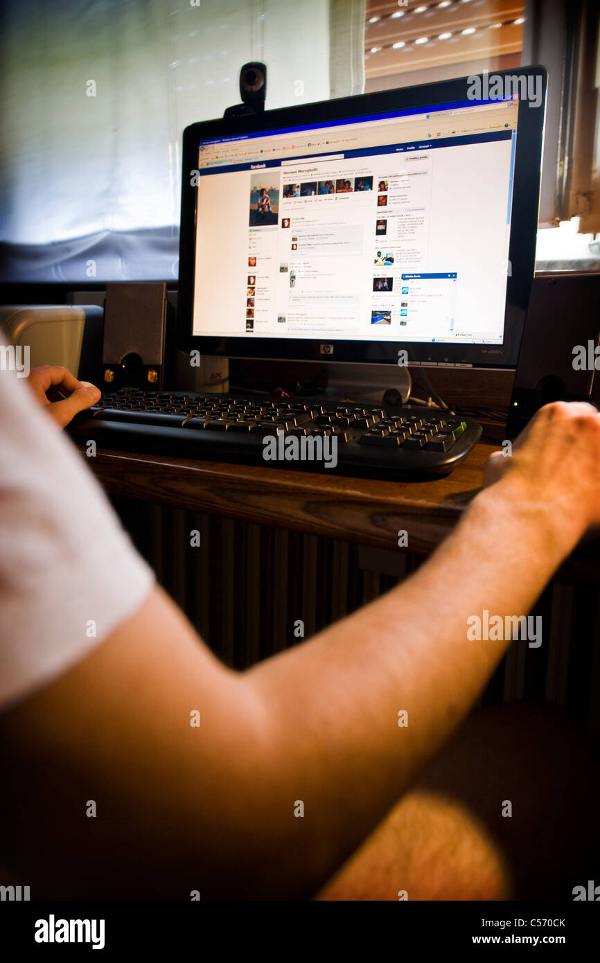 Boy, facebook, computer Stock Photo - Alamy