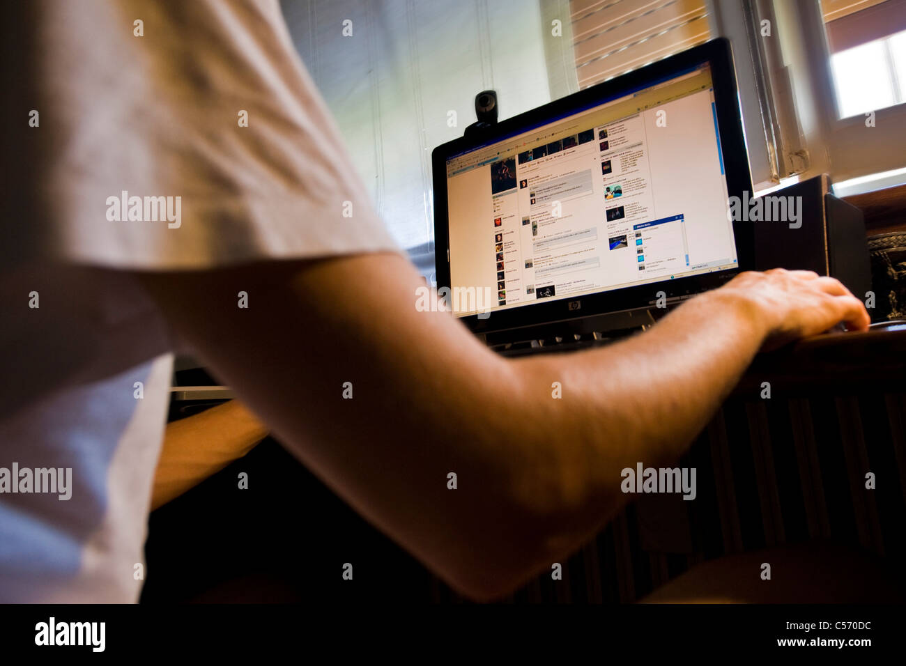 Boy, facebook, computer Stock Photo - Alamy