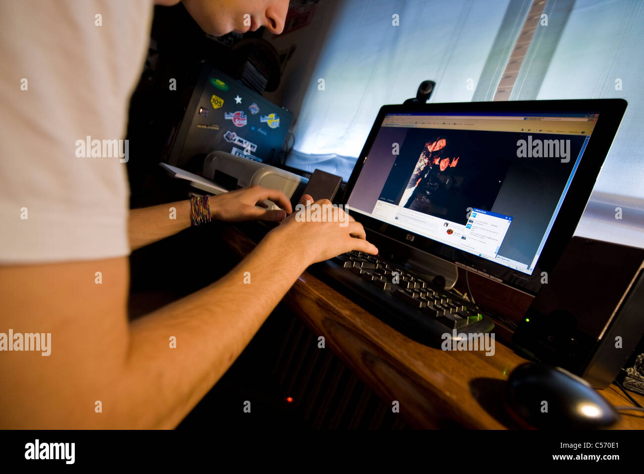 Boy, facebook, computer Stock Photo - Alamy