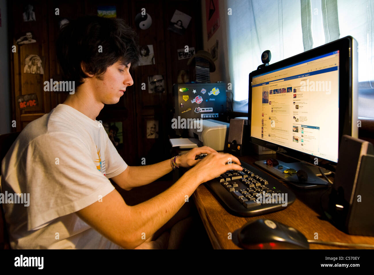 Boy, facebook, computer Stock Photo - Alamy